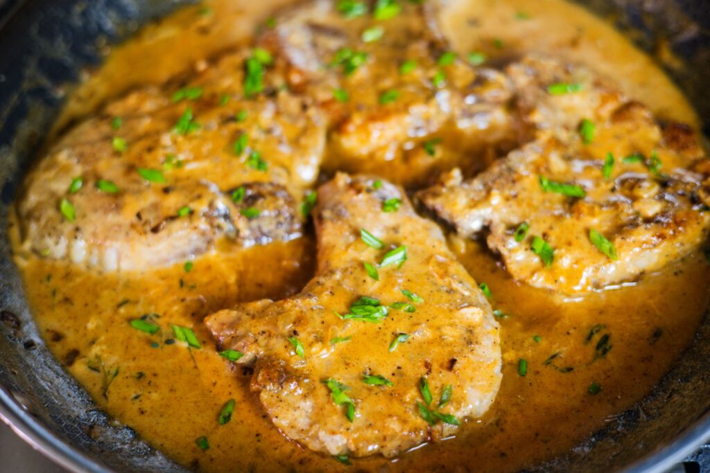 Cajun Comfort Food: Smothered Pork Chops Like Grandma's! - Mimi's ...